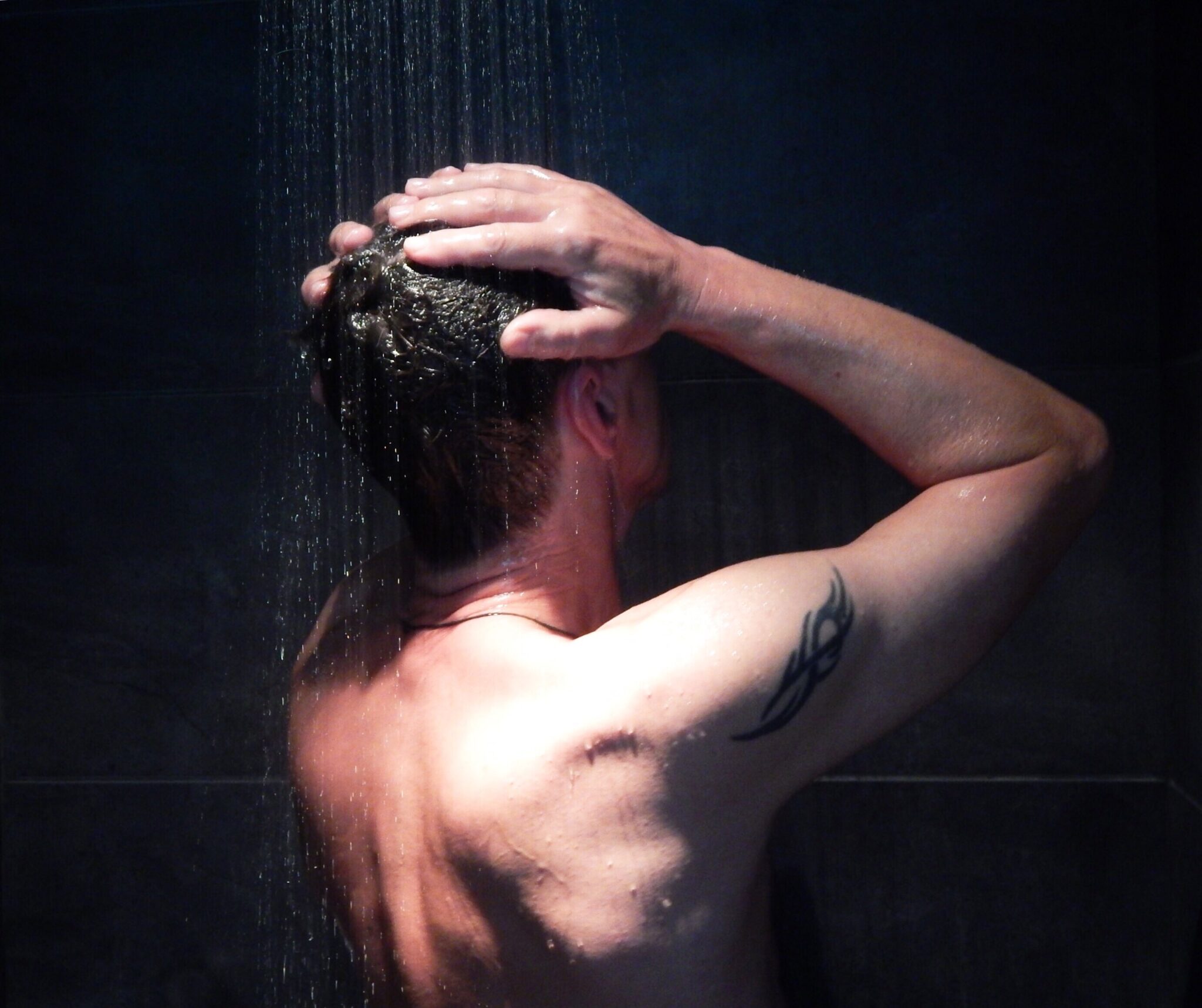 Benefits of Warm Showers for Athletes - Rheem